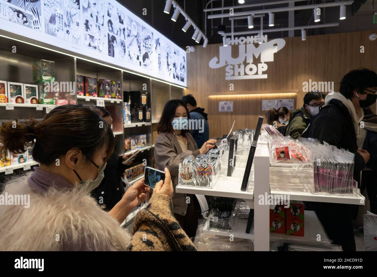 SHANGHAI, CHINA - DECEMBER 7, 2021 - Customers select comic strip ...