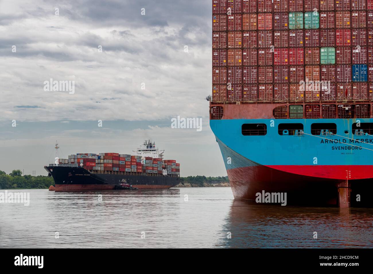 A container ship in the Savannah River arrives to the Port of Savannah ...