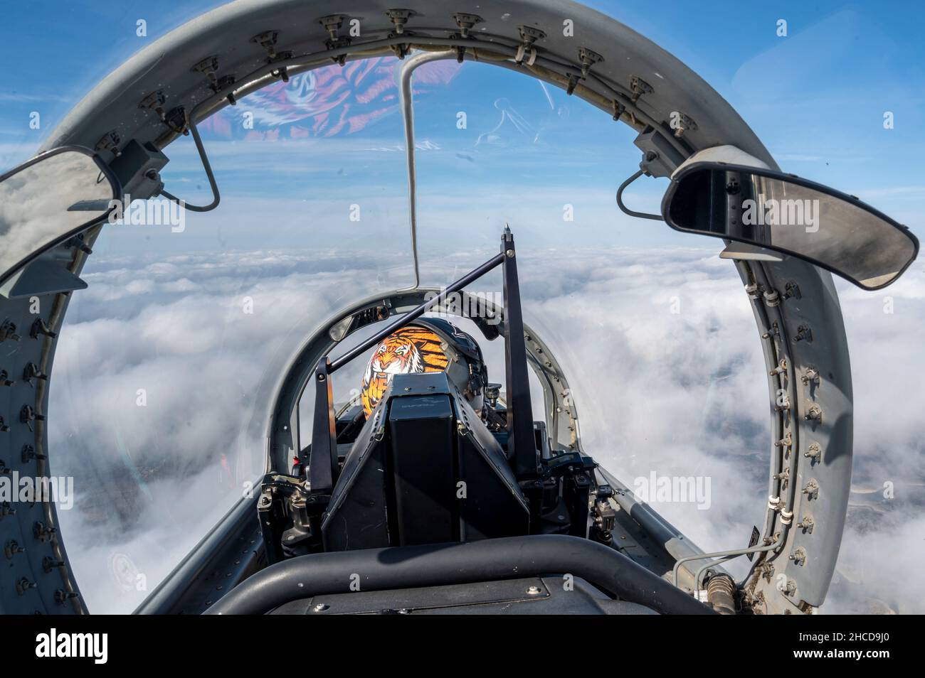 A Texan II T-6 flies through the air as it performs standard training ...