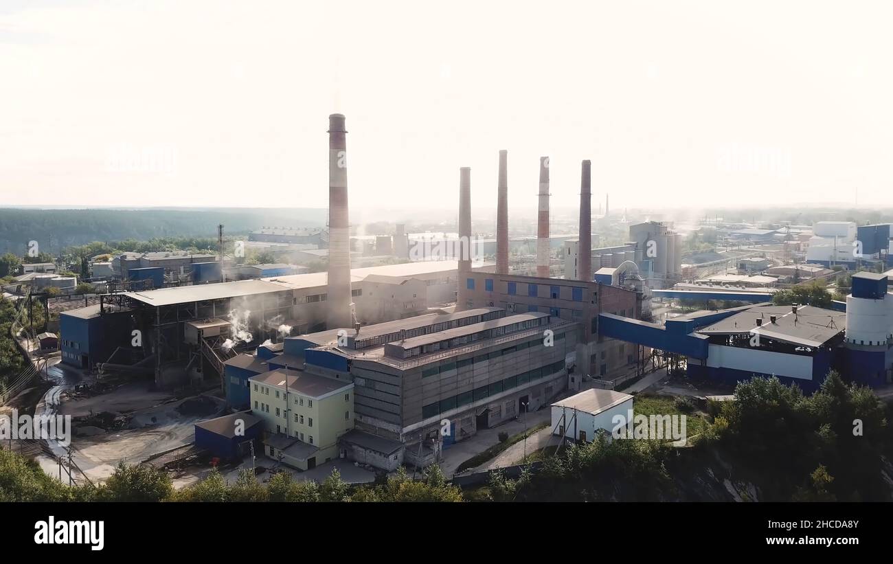 Aerial view of industrial area with chemical plant. Smoking chimney of ...