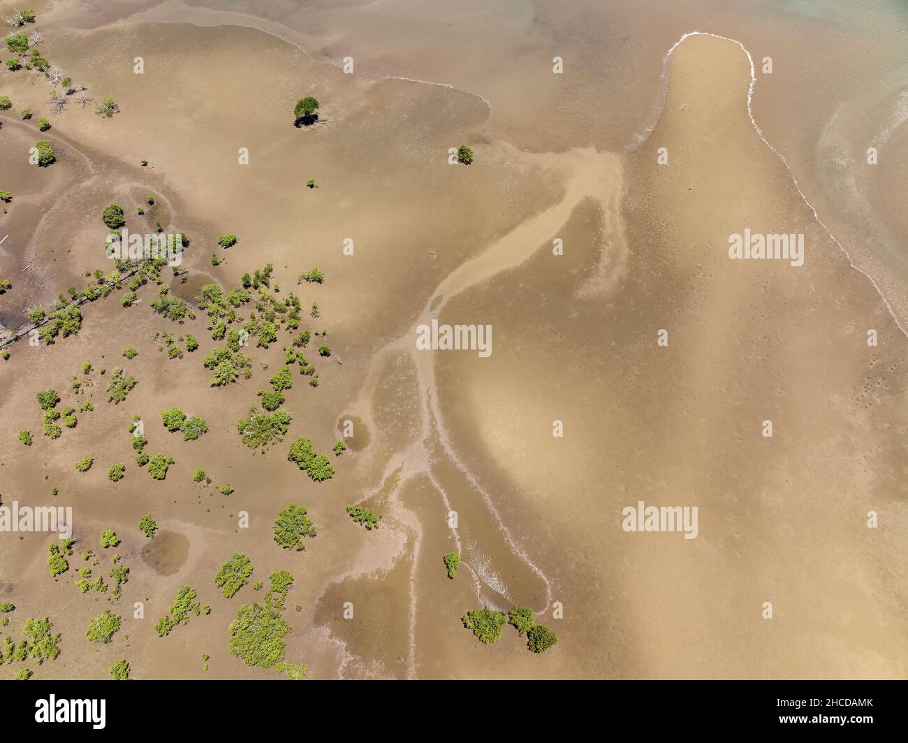 Drone aerial landscape pattern of textured ocean sands at low tide ...