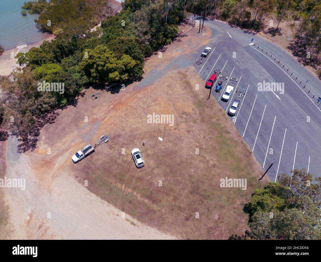 Overhead drone landing site with launch pad at a boat ramp with parked ...