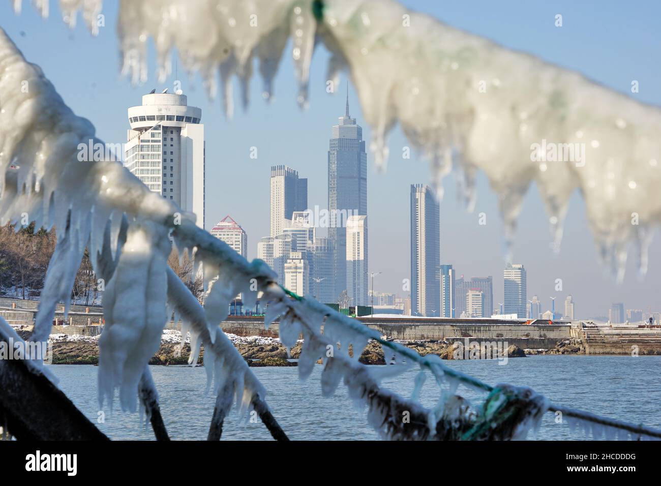 YANTAI, CHINA - DECEMBER 27, 2021 - Sea ice forms on the chain of a ...