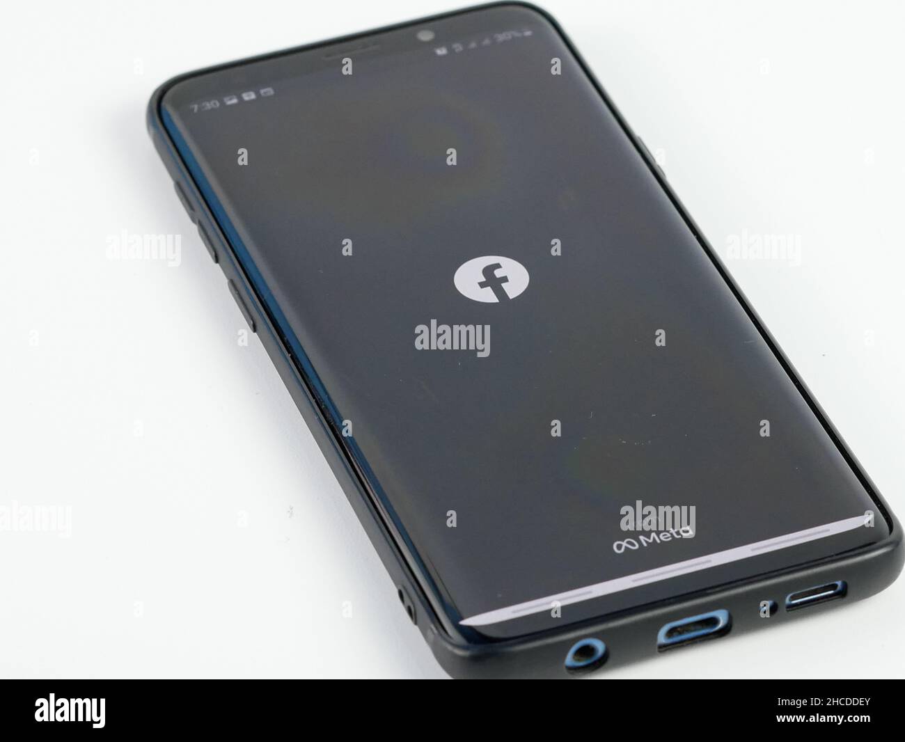 smartphone screen display is opening the facebook application from meta ...