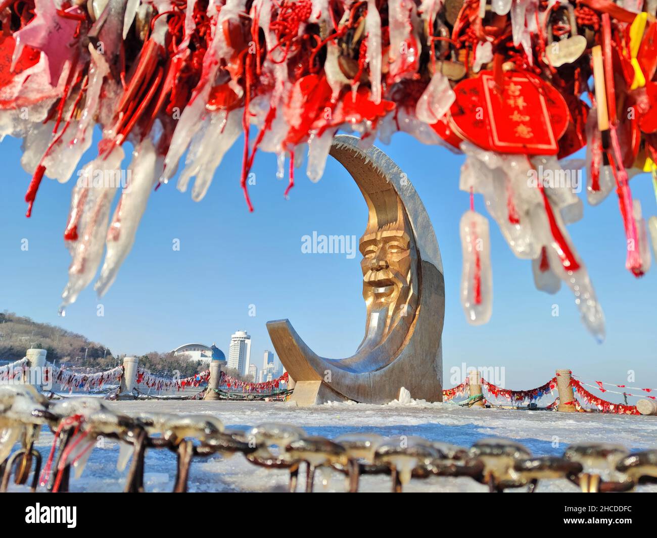 YANTAI, CHINA - DECEMBER 27, 2021 - Sea ice forms on the chain of a ...