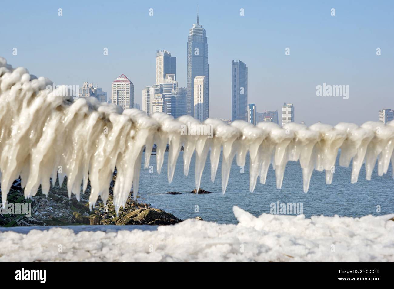 YANTAI, CHINA - DECEMBER 27, 2021 - Sea ice forms on the chain of a ...