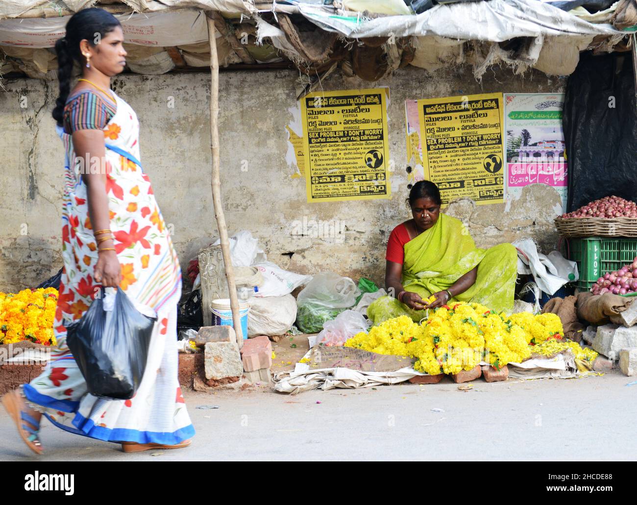 A colorful flower market in Kuppam, Andhra Pradesh, India Stock Photo ...