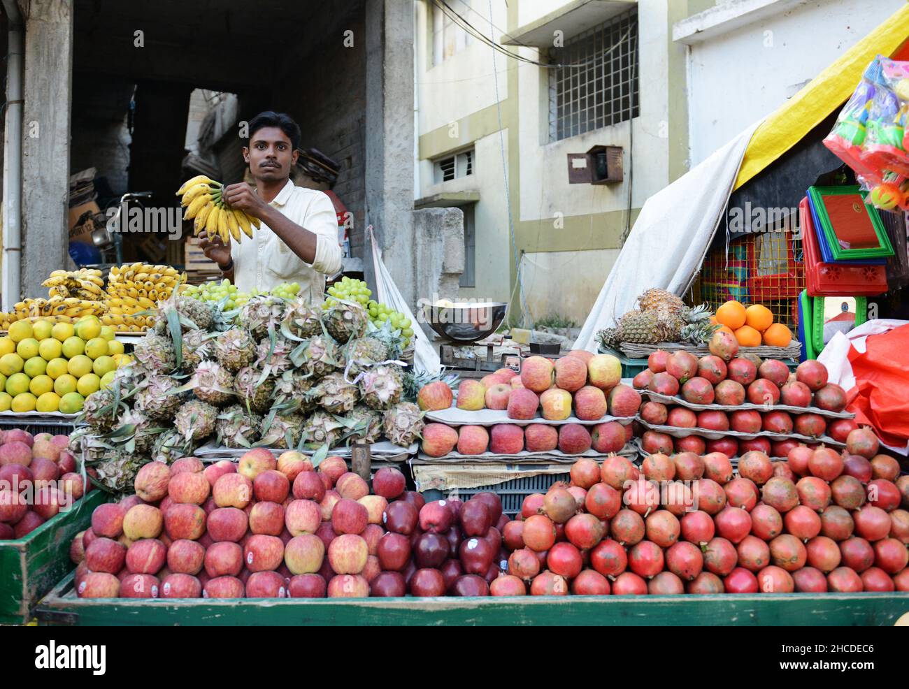 The colorful market on the main street in Kuppam, Andhra Pradesh, India ...