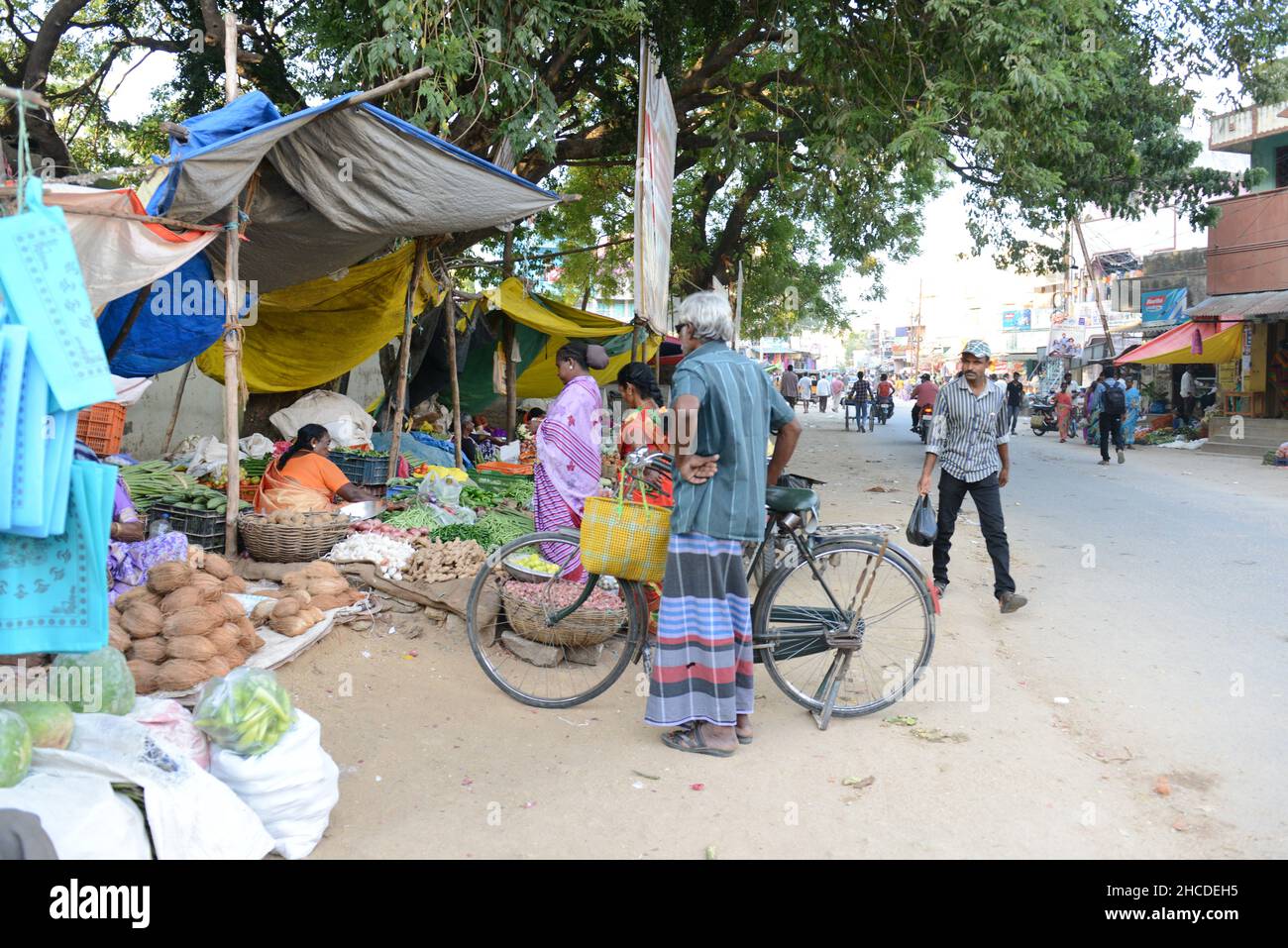 The colorful market on the main street in Kuppam, Andhra Pradesh, India ...