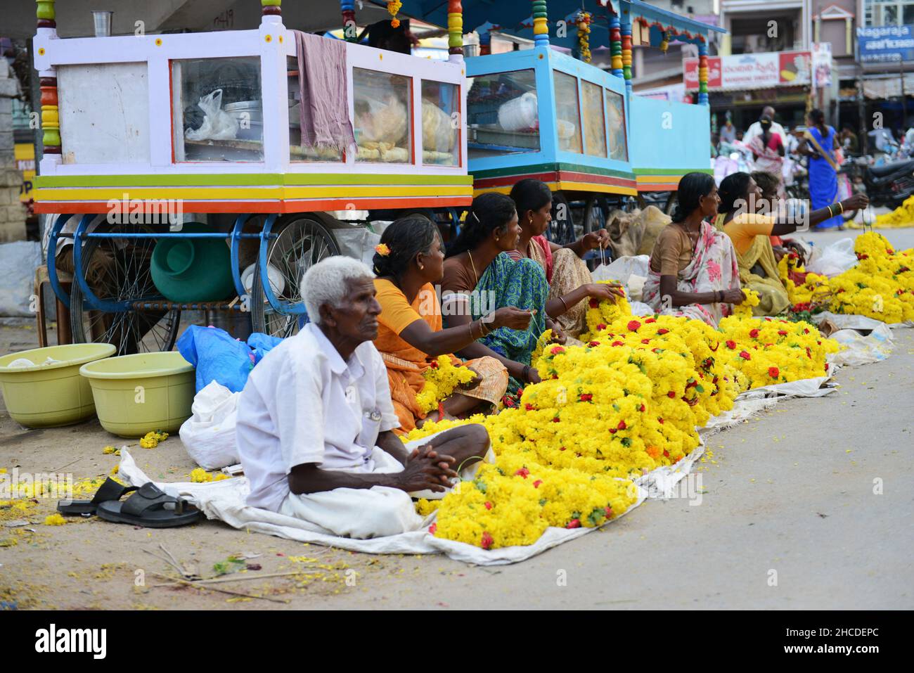 A colorful flower market in Kuppam, Andhra Pradesh, India Stock Photo ...