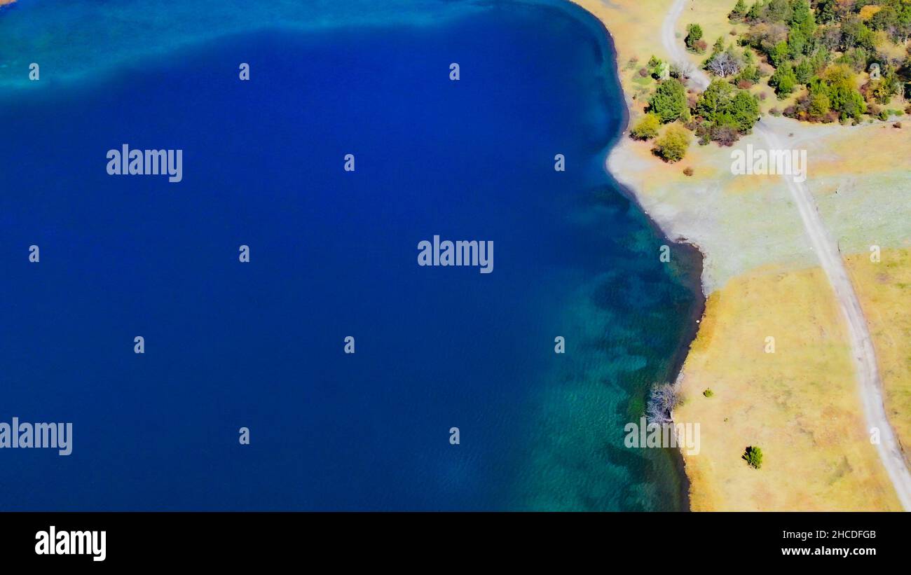 DIQING, CHINA - OCTOBER 26, 2021 - Green waters of bottomless Lake ...