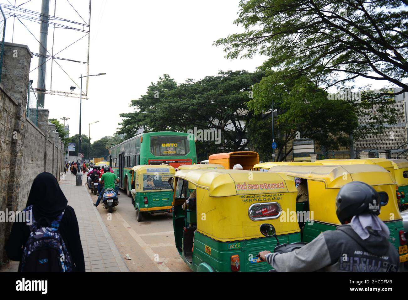 New auto rickshaws in Bangalore running on green energy Stock Photo - Alamy