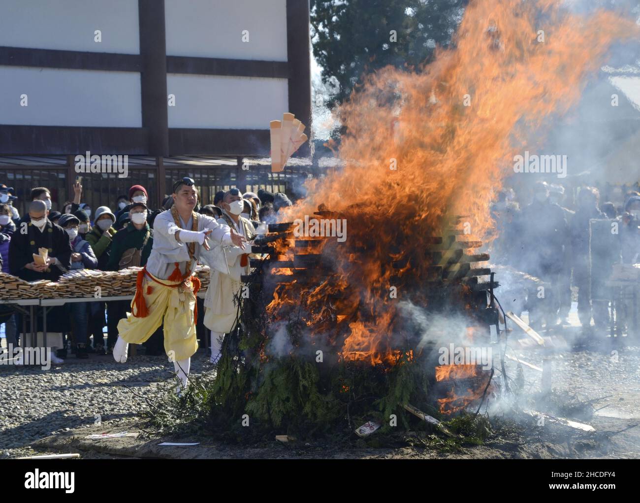 A year-end "otakiage" ritual, in which monks throw charms onto a temple ...