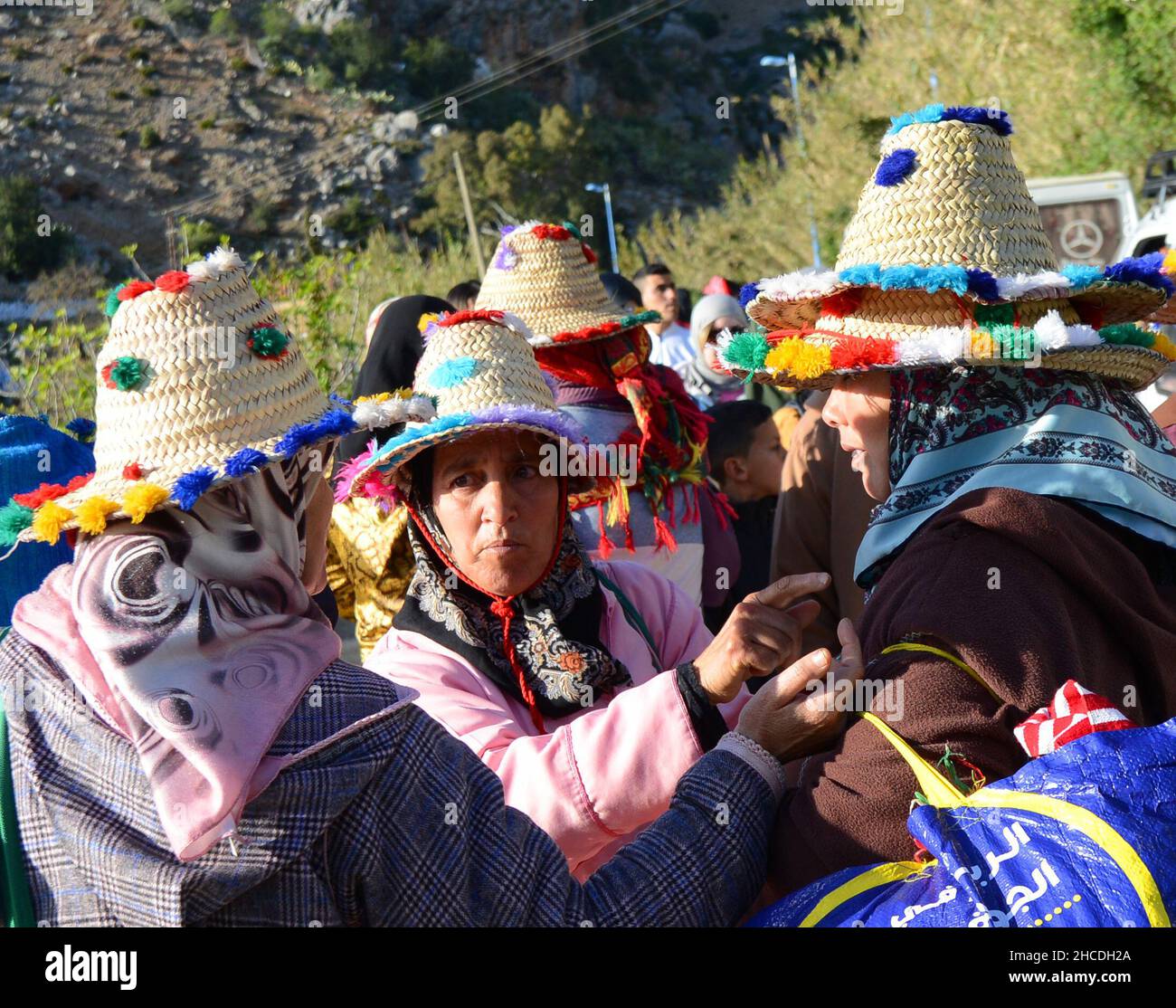 Moroccan women wearing traditional clothes in Chefchaouen, Morocco ...