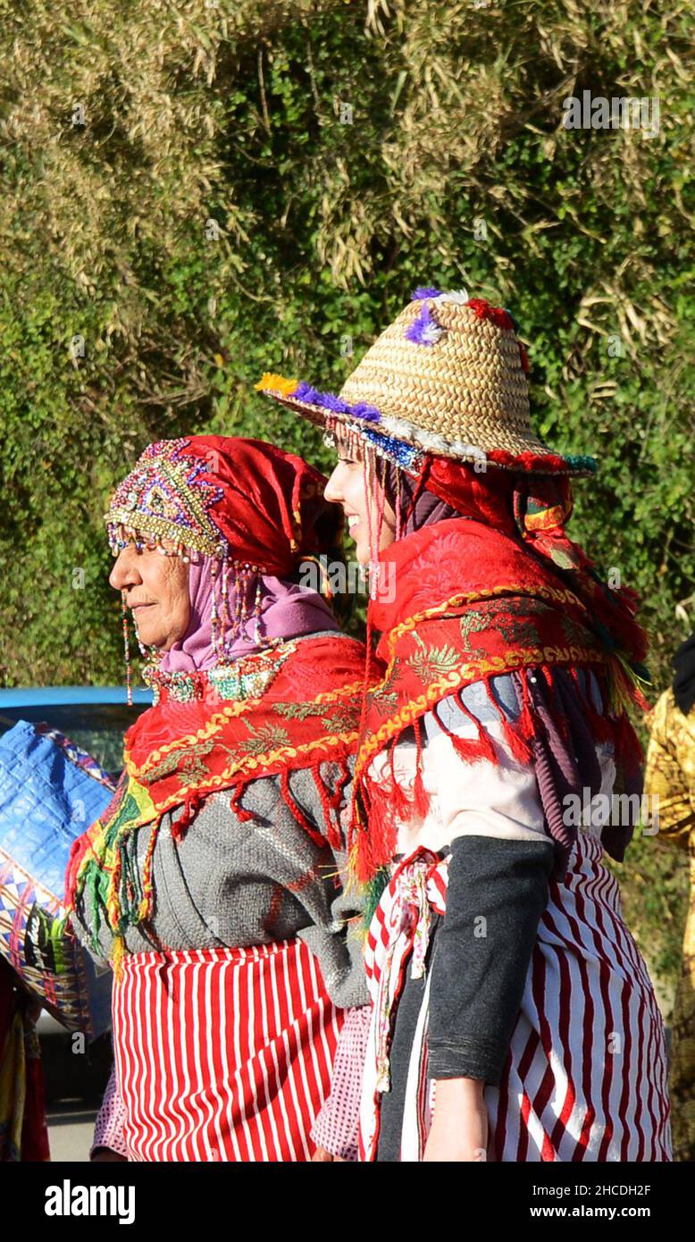 Moroccan women wearing traditional clothes in Chefchaouen, Morocco ...
