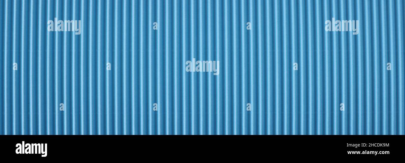 Closeup of blue striped perforated paper background Stock Photo - Alamy