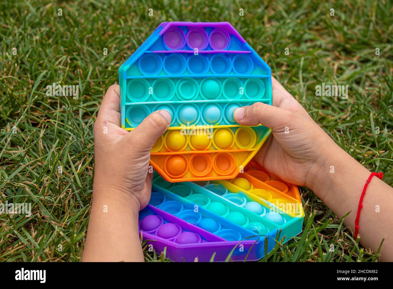 Girl plays anti stress sensory hi-res stock photography and images - Alamy