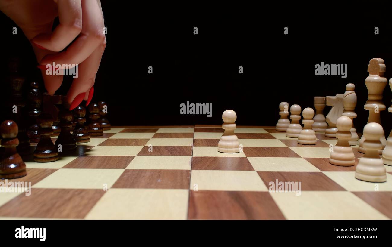 Photo of female hand holding chess figure Stock Photo - Alamy