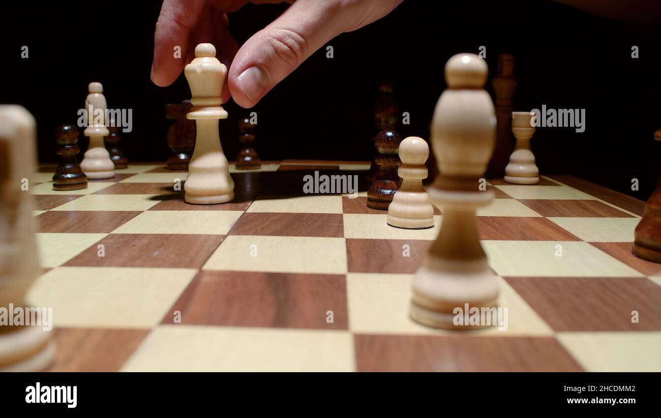 Hand holding chess figure hi-res stock photography and images - Alamy