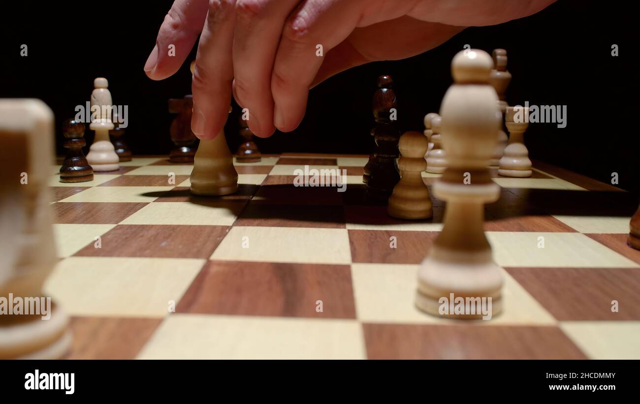 Image of male hand holding chess figure Stock Photo - Alamy