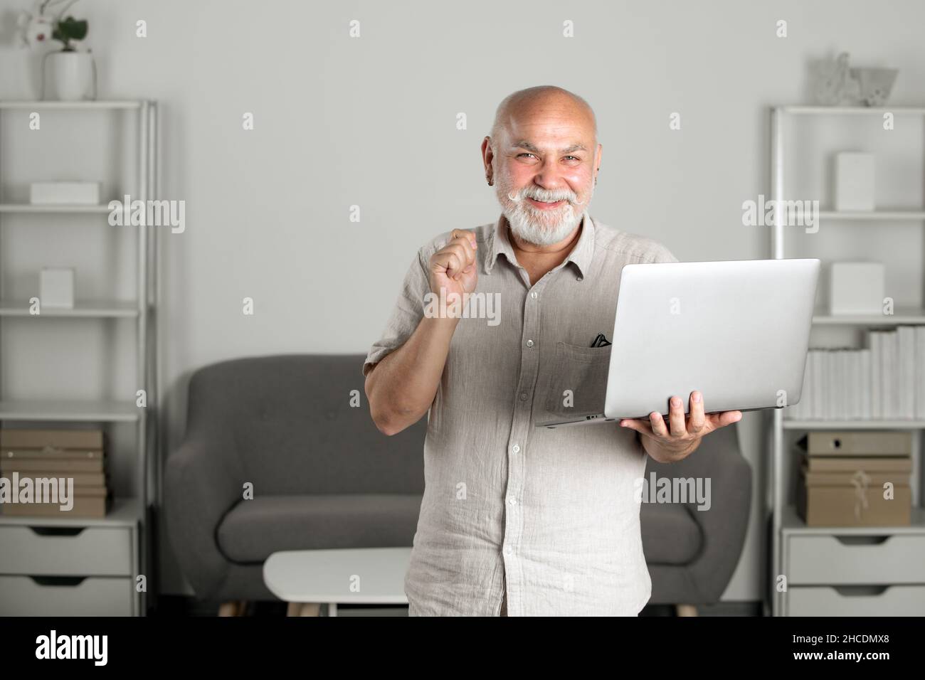 Mature middle aged business man using laptop working on computer. Old ...