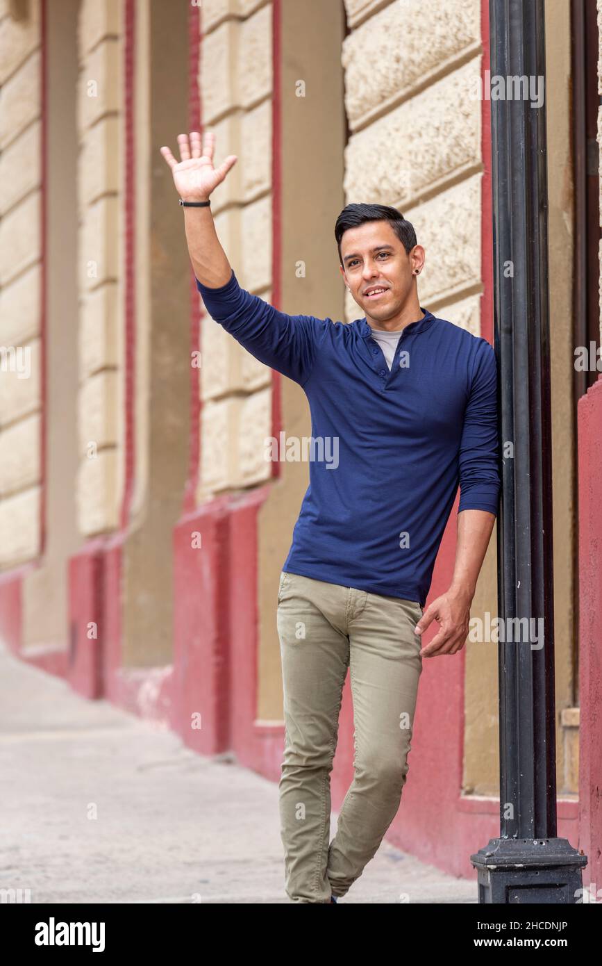 Man waving arms street hi-res stock photography and images - Alamy