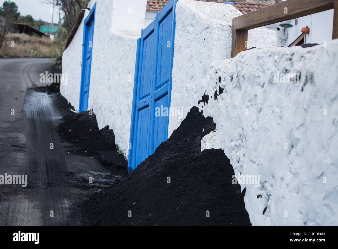 Volcanic ash on the streets in urban environment after an eruption. Ash ...