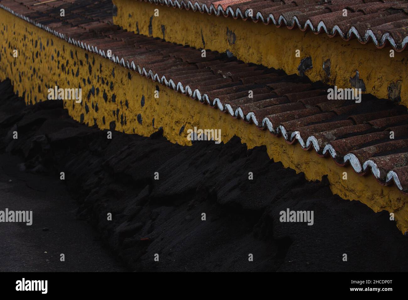 Volcanic ash on the streets in urban environment after an eruption. Ash ...