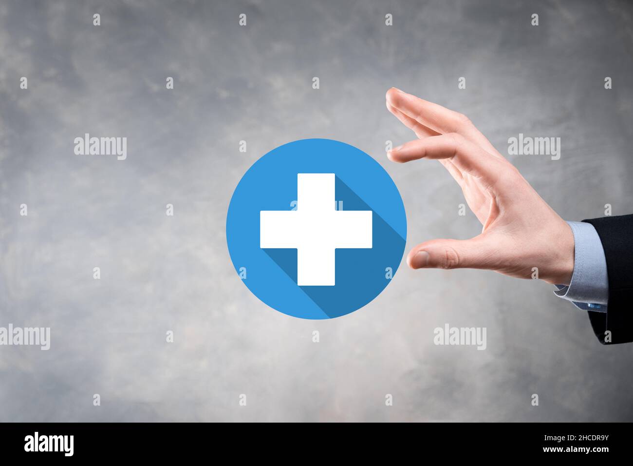 Businessman hold plus icon, man hold in hand offer positive thing such ...