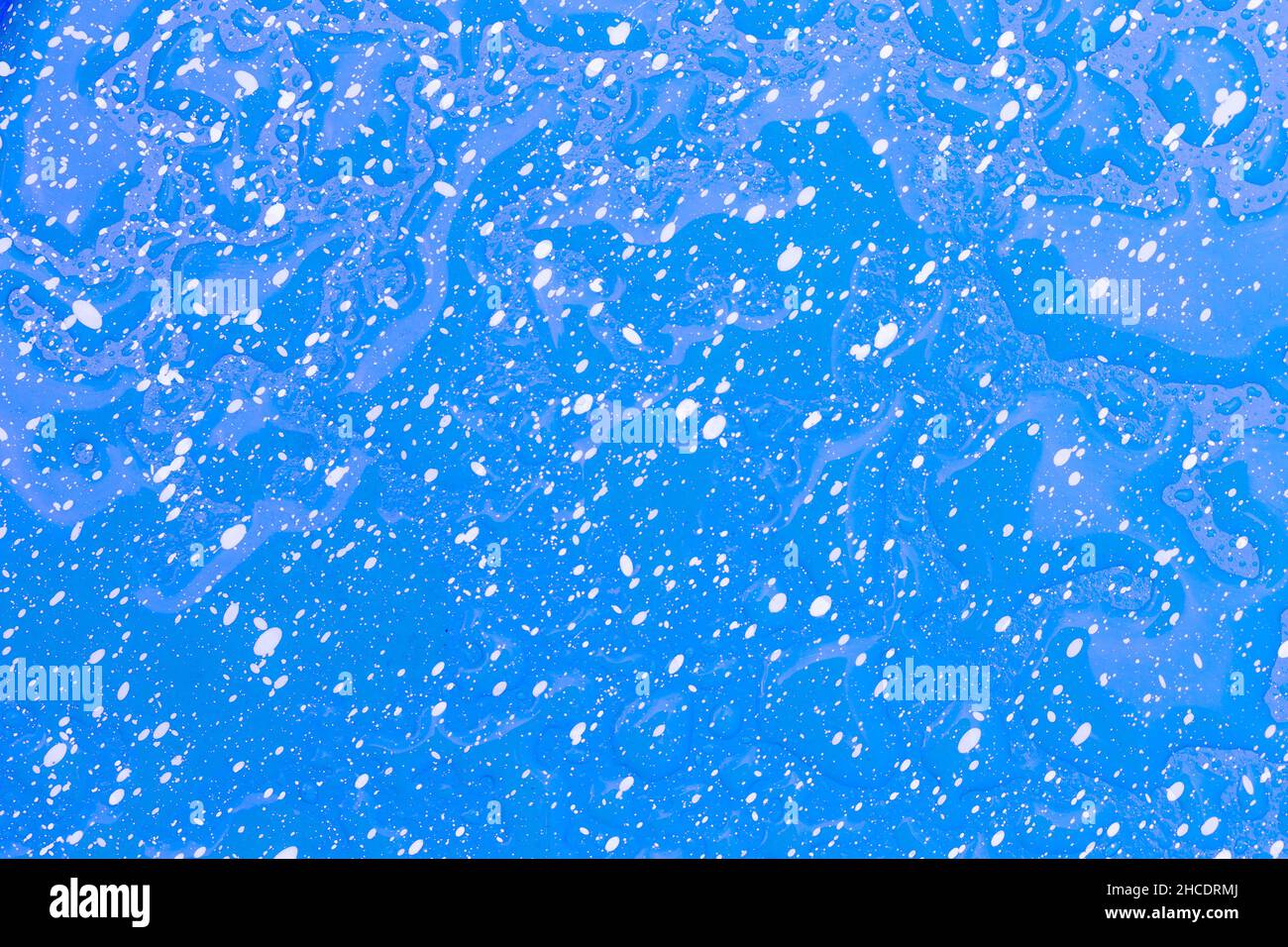 Water drop on blue and white dot use for background Stock Photo - Alamy