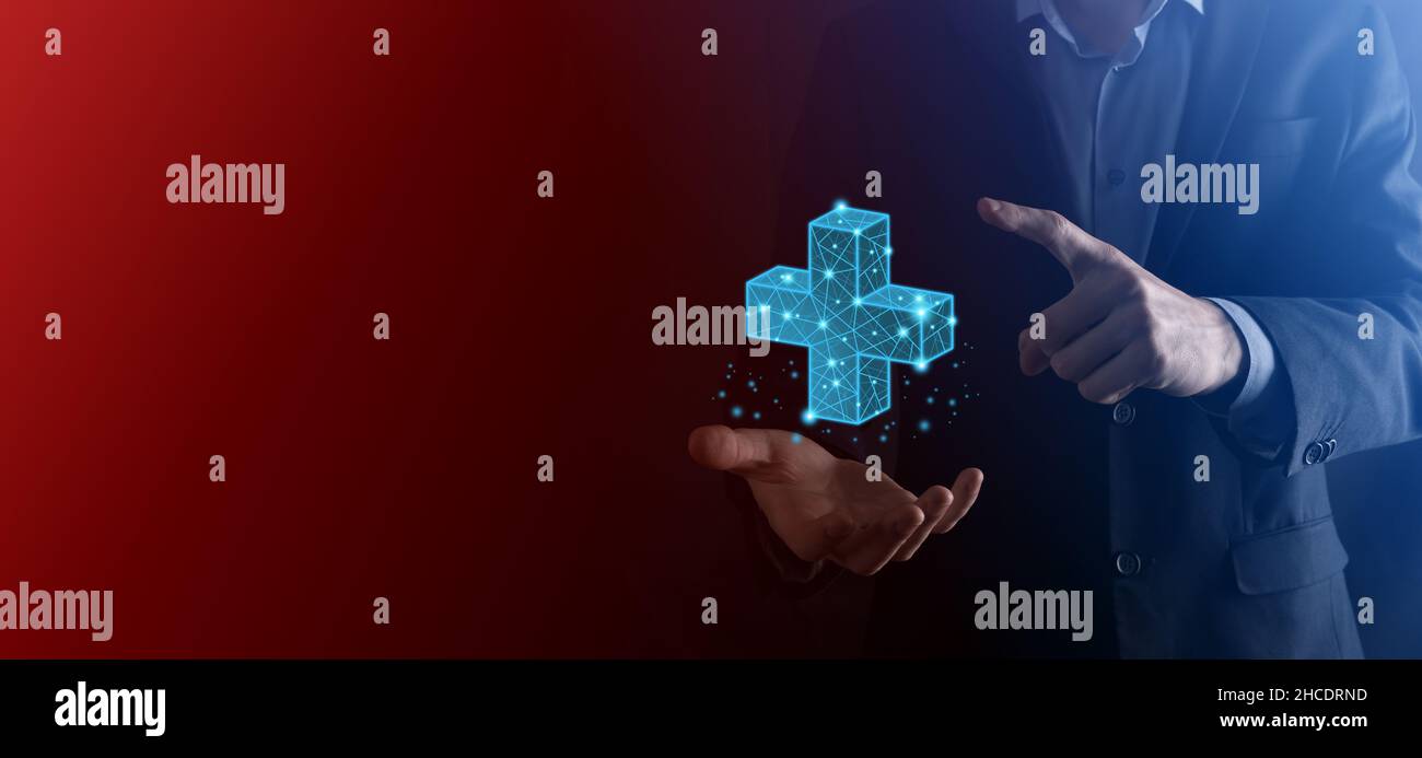 Businessman hand holding 3D plus low polygonal icon.Plus sign virtual ...