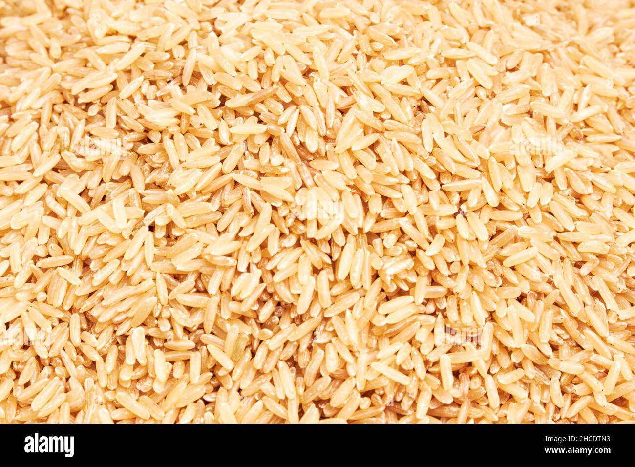 Raw rice background. Asian food. Healthy food concept Stock Photo - Alamy