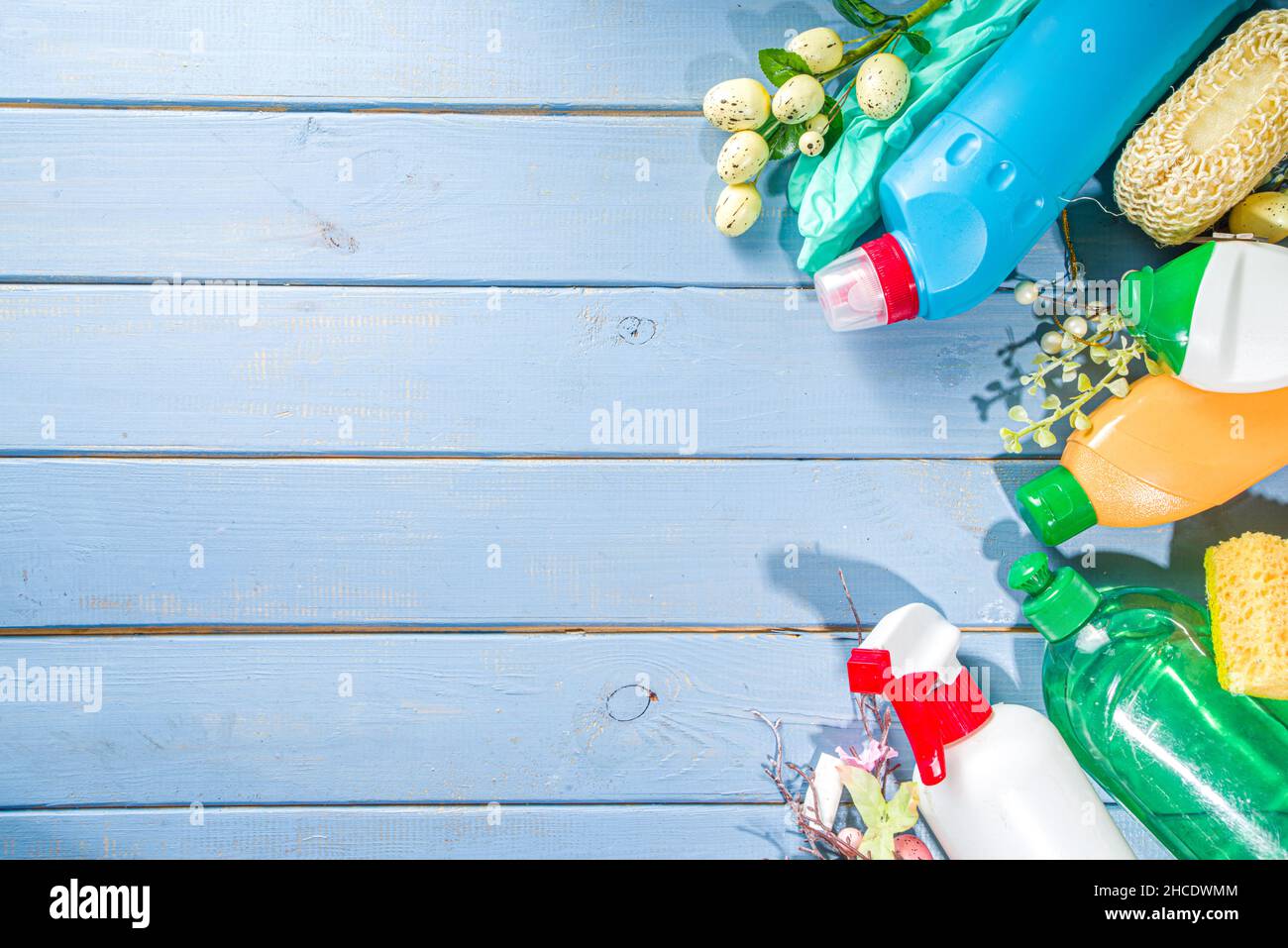 Spring cleaning concept. Sun lighted bright blue background with ...