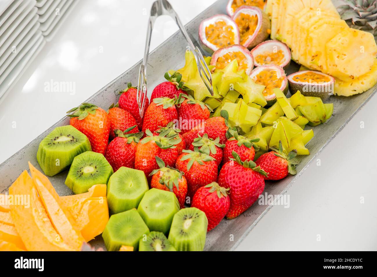 Fruit Buffet - fresh fruit cut on plates ready of eating Stock Photo ...