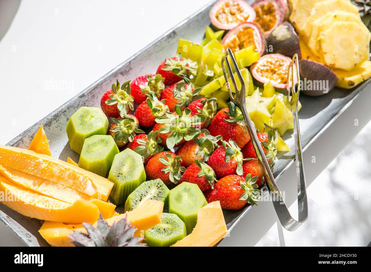 Fruit Buffet - fresh fruit cut on plates ready of eating Stock Photo ...