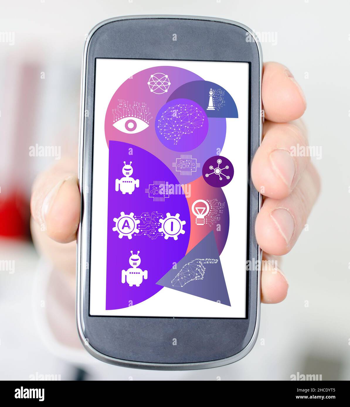 Hand holding a smartphone with ai concept Stock Photo - Alamy