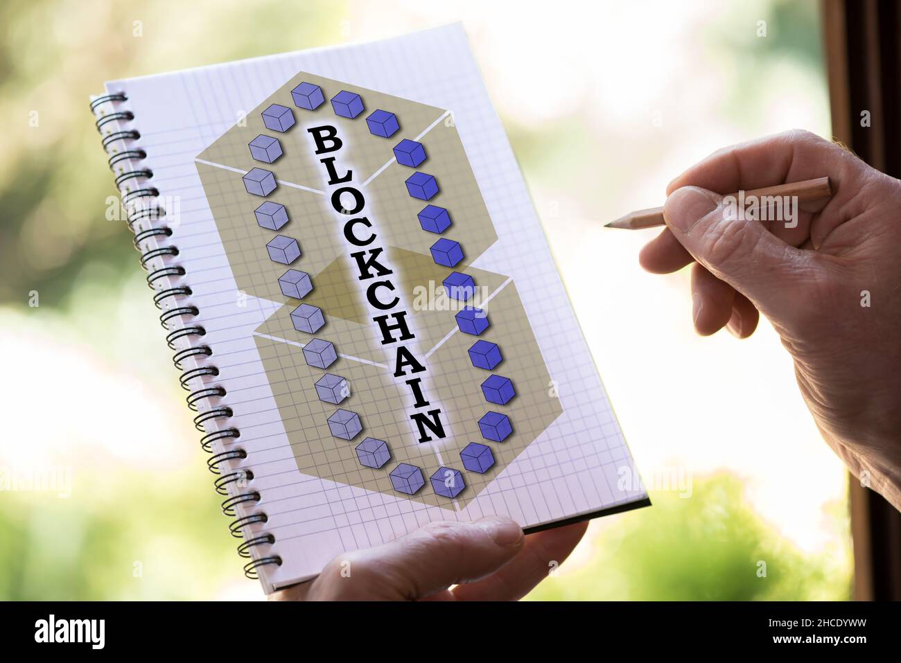 Hand drawing blockchain technology concept on a notepad Stock Photo - Alamy