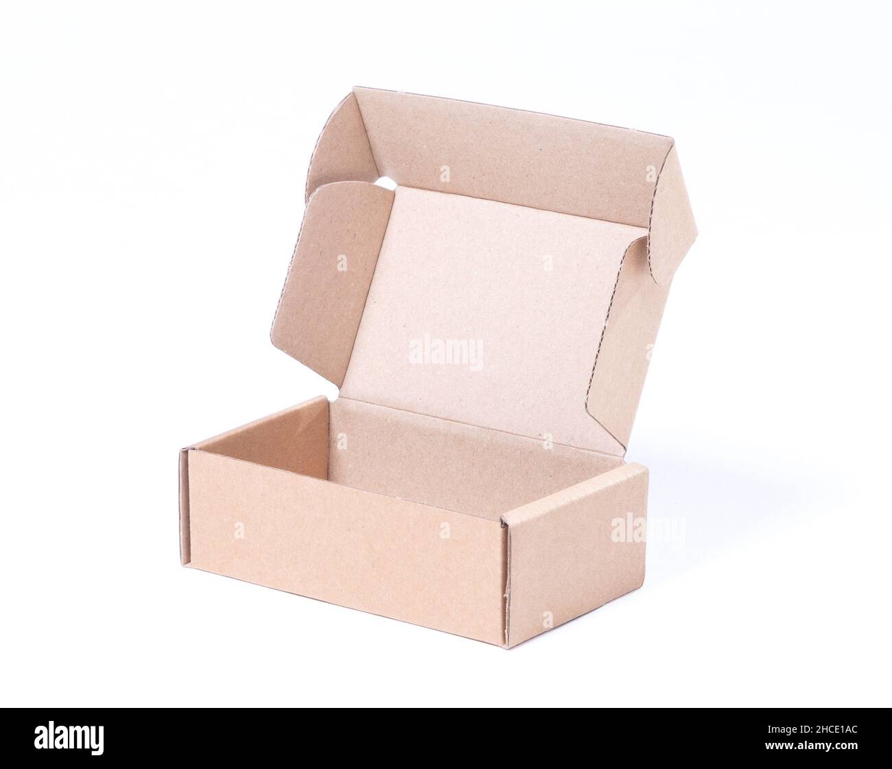 Open cardboard small box isolated on white background Stock Photo - Alamy