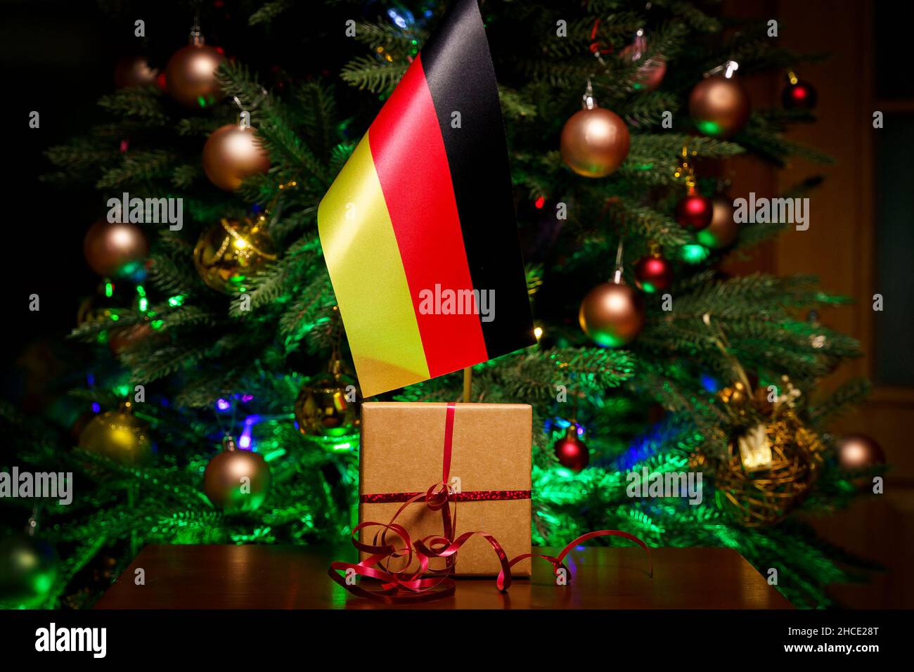 Germany flag and gift box on the background of the Christmas tree Stock ...