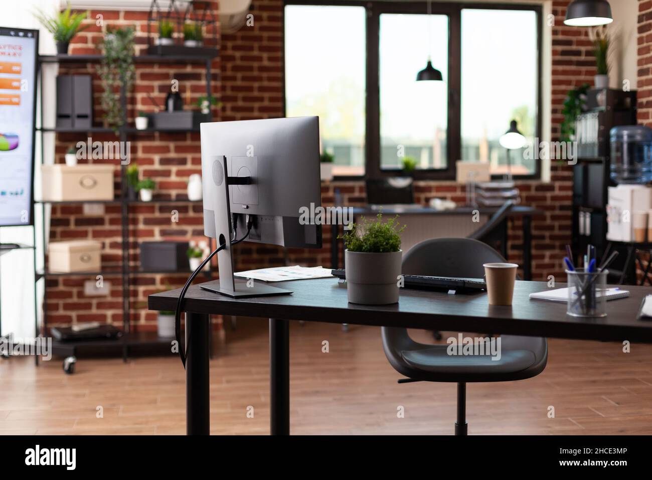 Nobody in business office with computer and instruments on desk. Empty ...