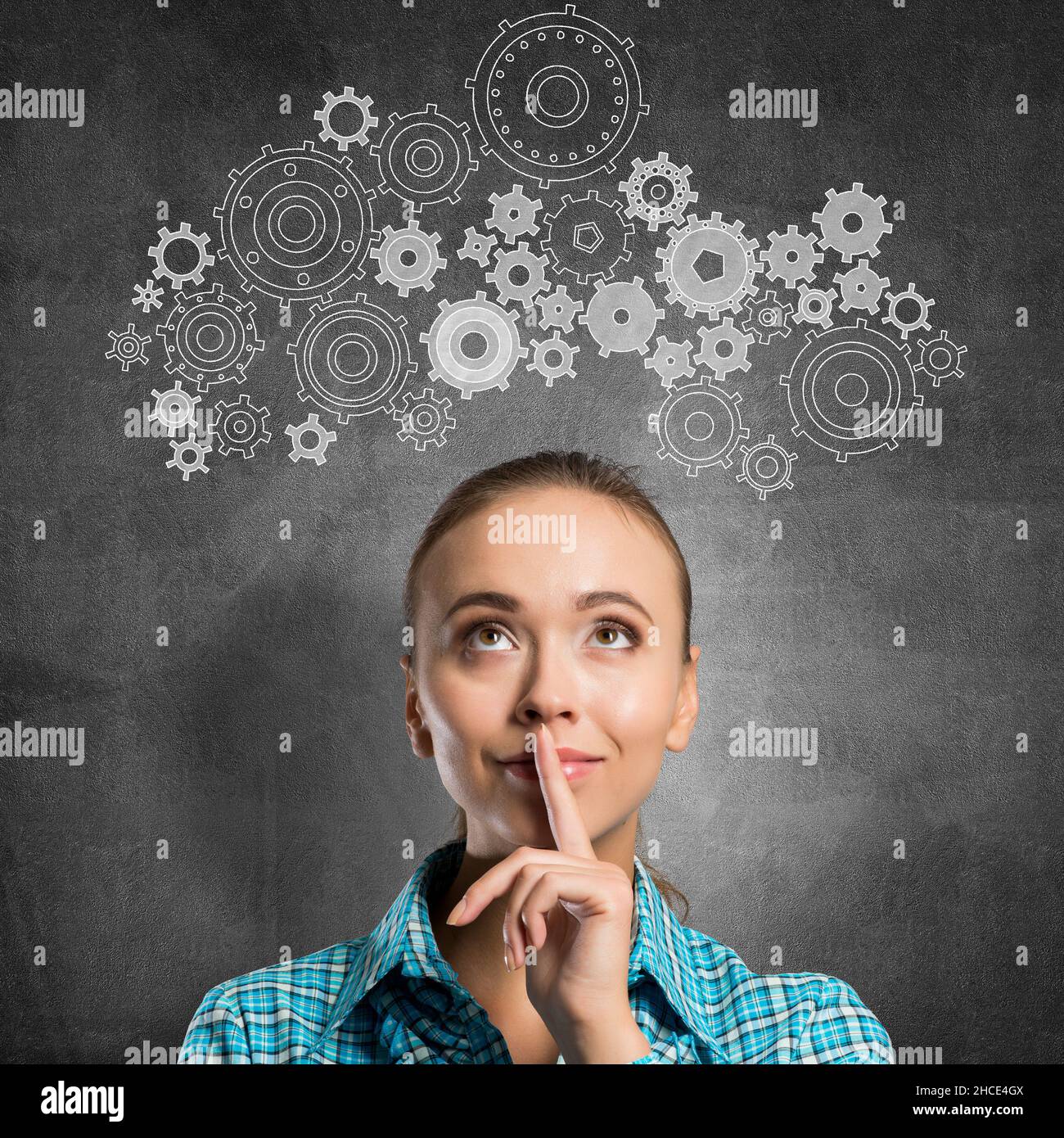 Girl showing hush gesture Stock Photo - Alamy