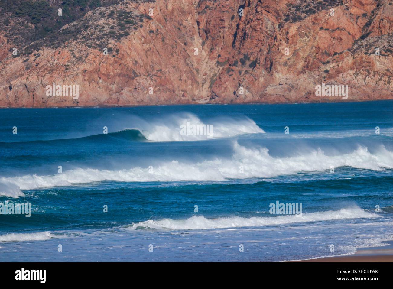Perfect wave breaking in a beach. Surf spot Stock Photo - Alamy