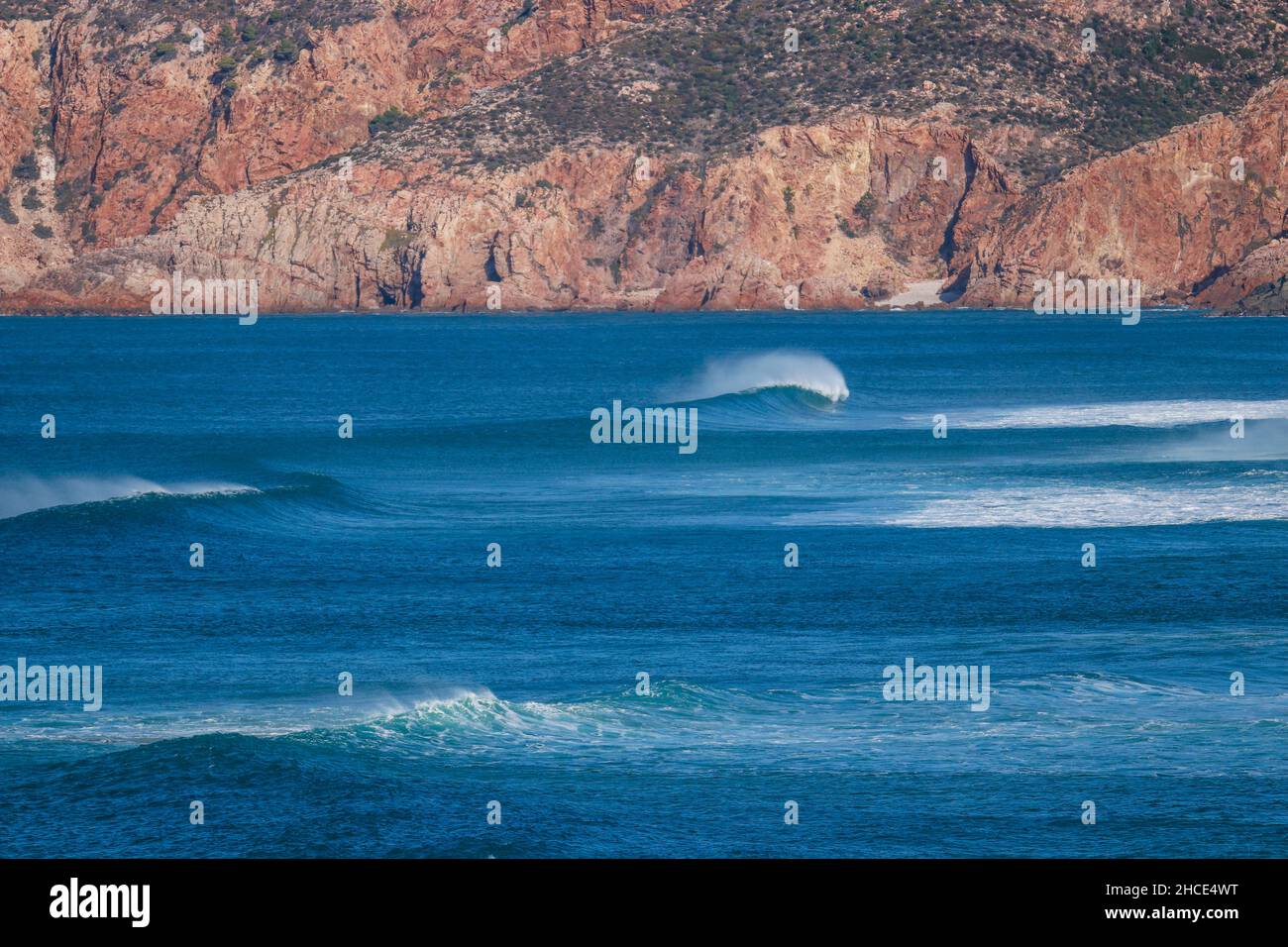 Perfect wave breaking in a beach. Surf spot Stock Photo - Alamy