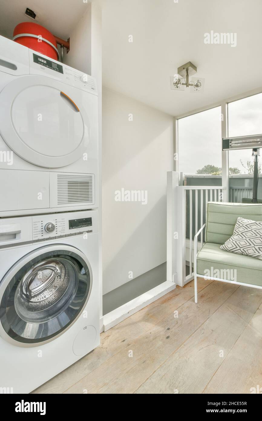 Modern washing machines hi-res stock photography and images - Alamy