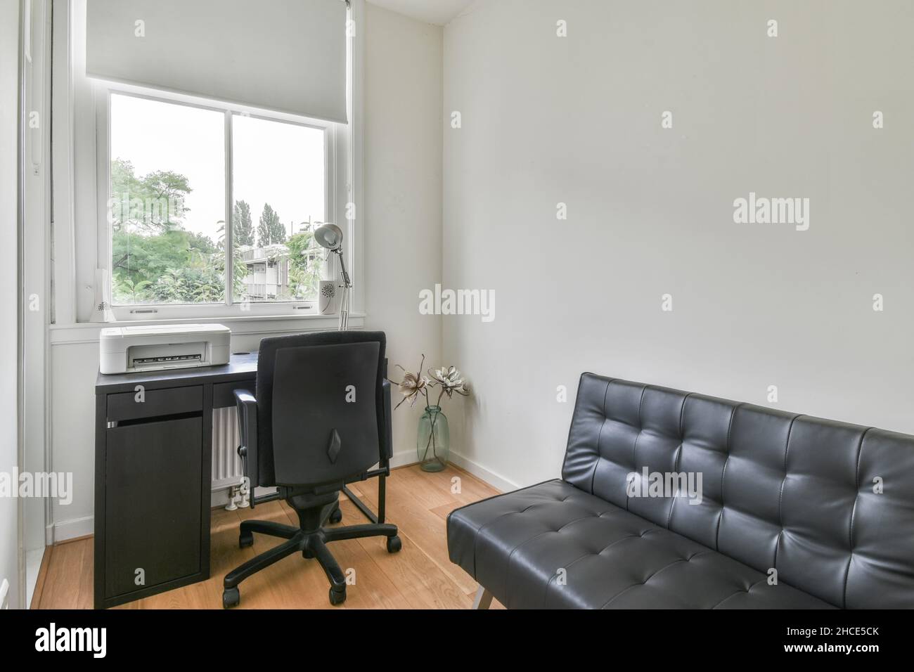 Interior of modern room with workspace furnished with comfortable ...