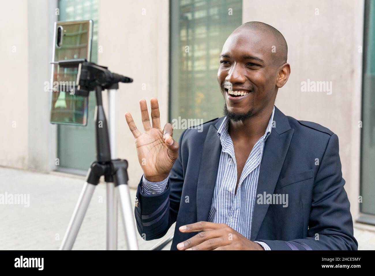 Live streaming on the street hi-res stock photography and images - Alamy