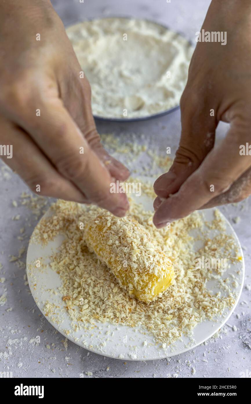 Potato coating hi-res stock photography and images - Alamy