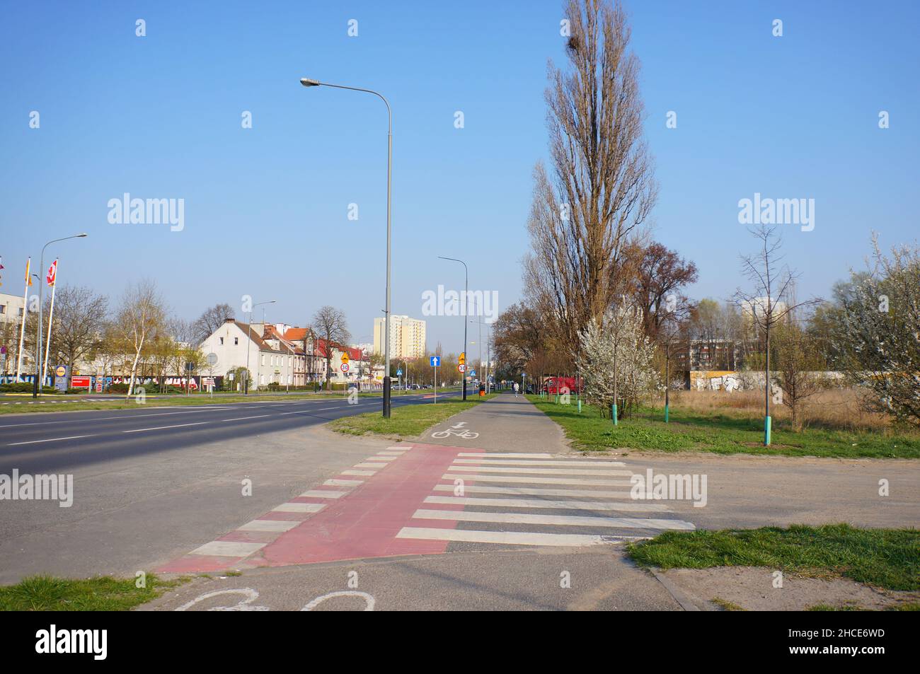 Zebra crossing in front of a sidewalk and bike route. Poznan, Poland ...