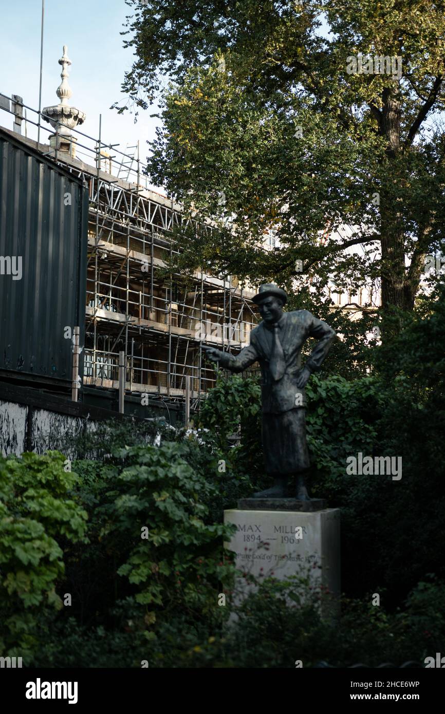 The statue of comedian Max Miller on the background of the construction ...