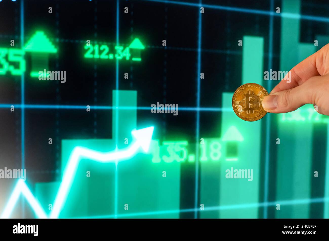 Crop anonymous person demonstrating metal cryptocurrency bitcoin ...